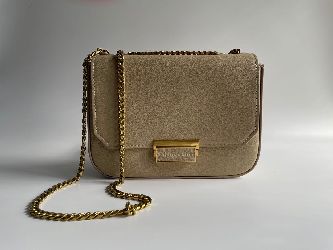 Push lock chain sling bag, Women's Fashion, Bags & Wallets, Cross-body ...