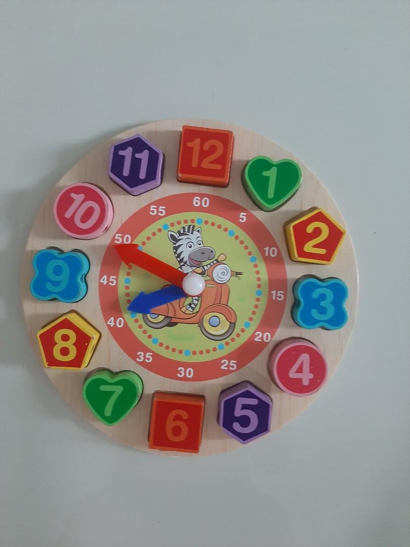 Wooden clock puzzles, Babies & Kids, Infant Playtime on Carousell