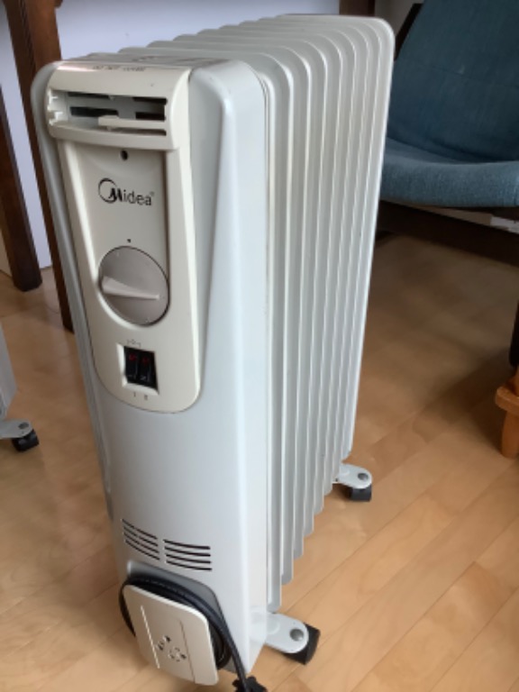 Midea oil filled portable heater, 家庭電器, 冷氣機及暖風機 - Carousell