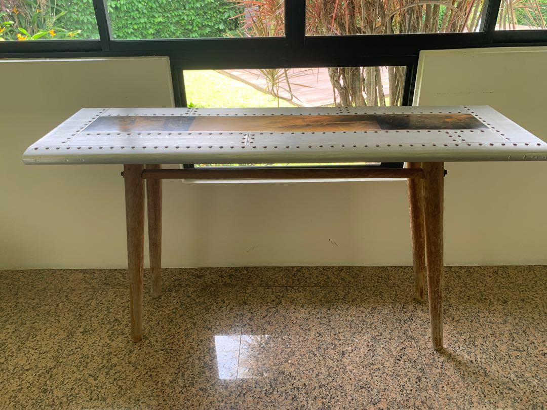 Fun airplane side table/console with rivets. Wooden legs, Furniture ...