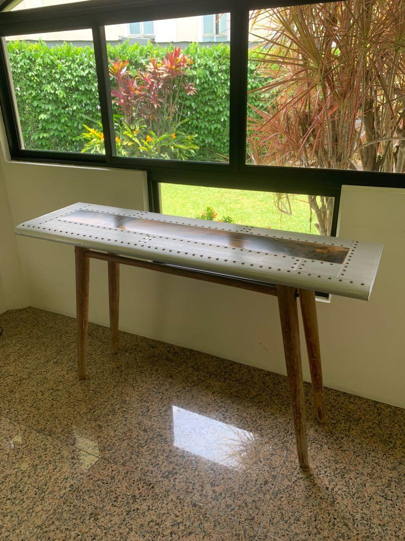 Fun airplane side table/console with rivets. Wooden legs, Furniture ...
