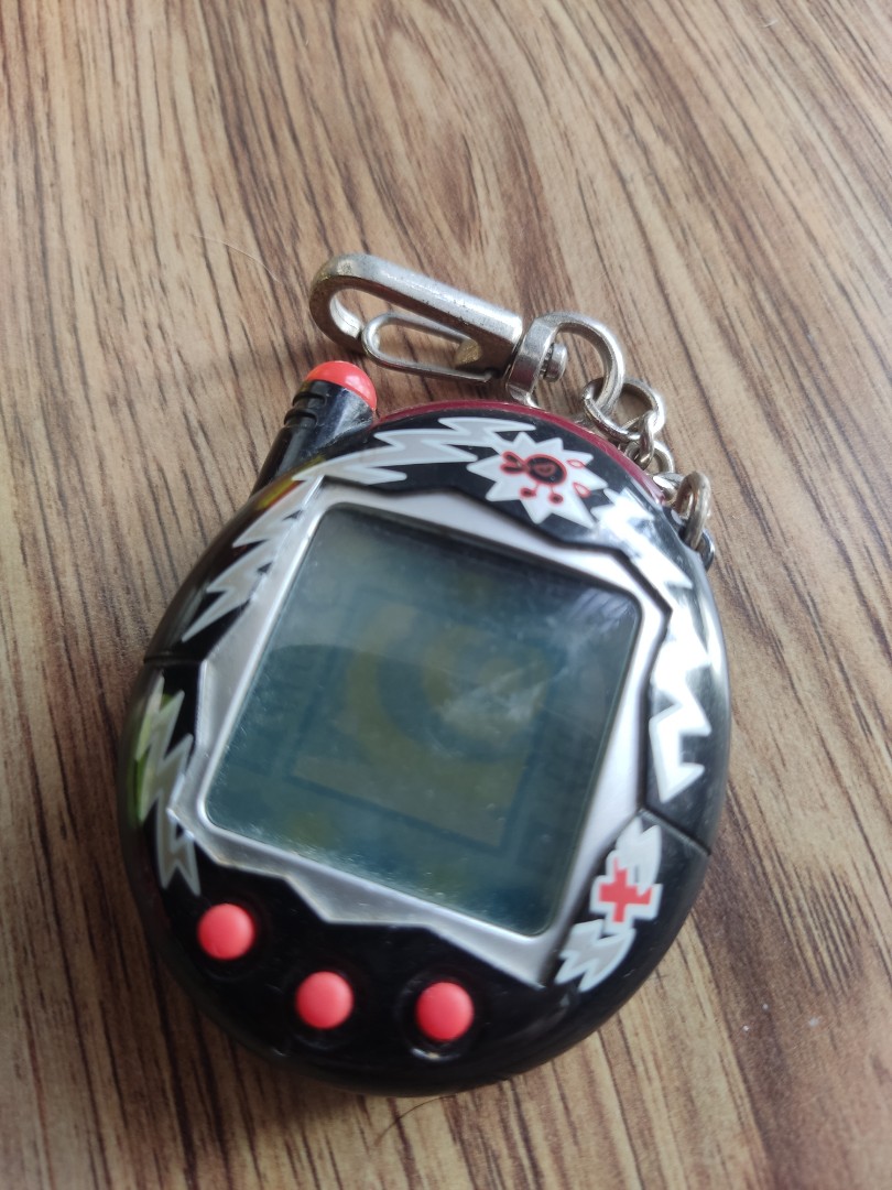 Tamagotchi black ketai, Hobbies & Toys, Toys & Games on Carousell