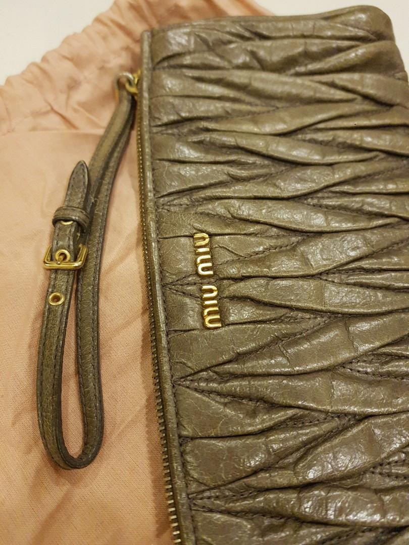 Auth Mui Mui Grey Clutch, Luxury, Bags & Wallets on Carousell