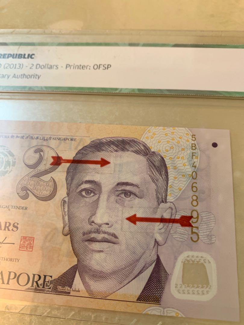 Portrait series $2 polymer with printing lines across portrait ( error ...