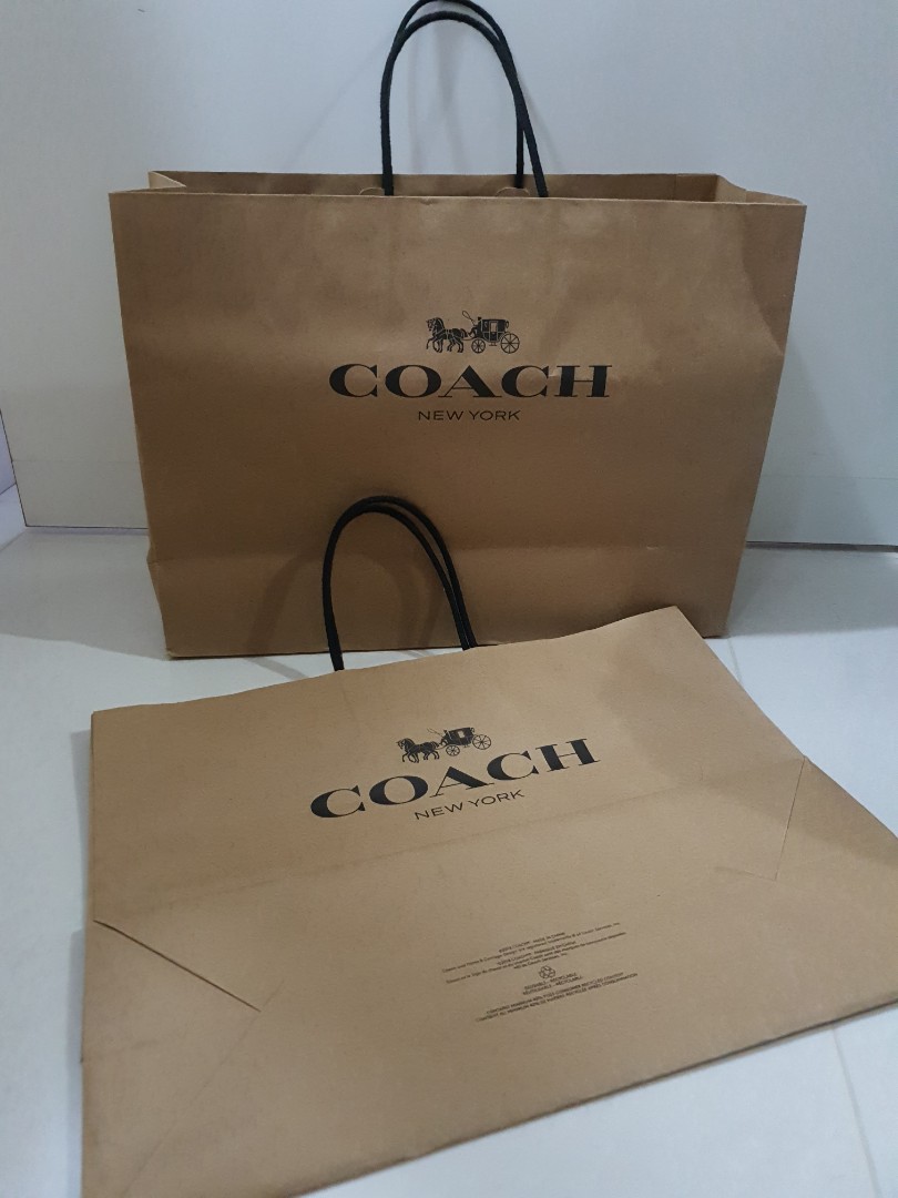 Coach paper carrier bag, Women's Fashion, Bags & Wallets, Tote Bags on ...