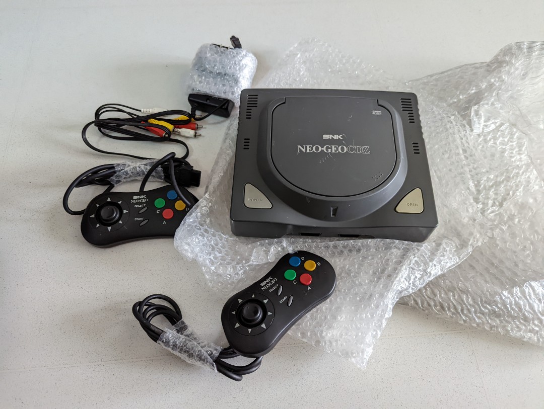 Neo geo CDZ turns on but don't read disc with 3 controller tested ...
