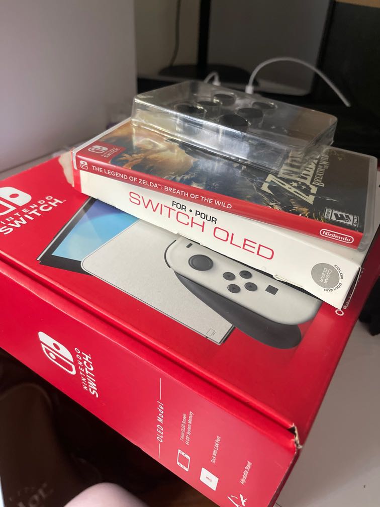 Nintendo Switch OLED + Free Zelda BOTW and accessories, Video Gaming ...