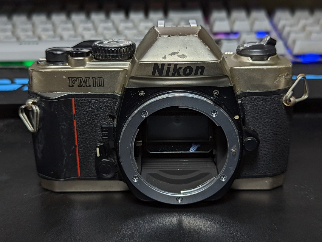 Nikon FM10 SLR 35mm Film Camera Body, Photography, Cameras on Carousell