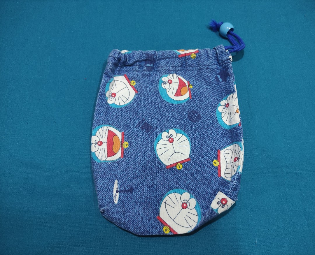 Doraemon Mini Pouch, Hobbies & Toys, Toys & Games on Carousell