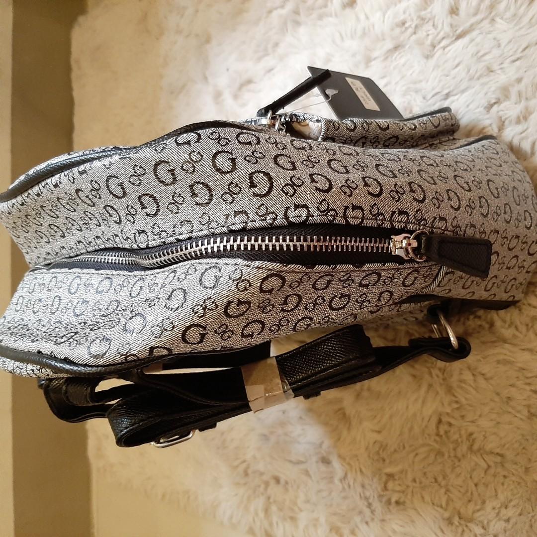 GUESS Monogram Backpack, Women's Fashion, Bags & Wallets, Backpacks on ...
