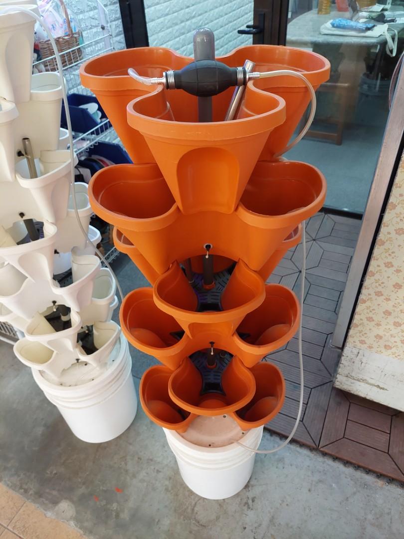Self watering stackable potting system for edible plants and gardening ...