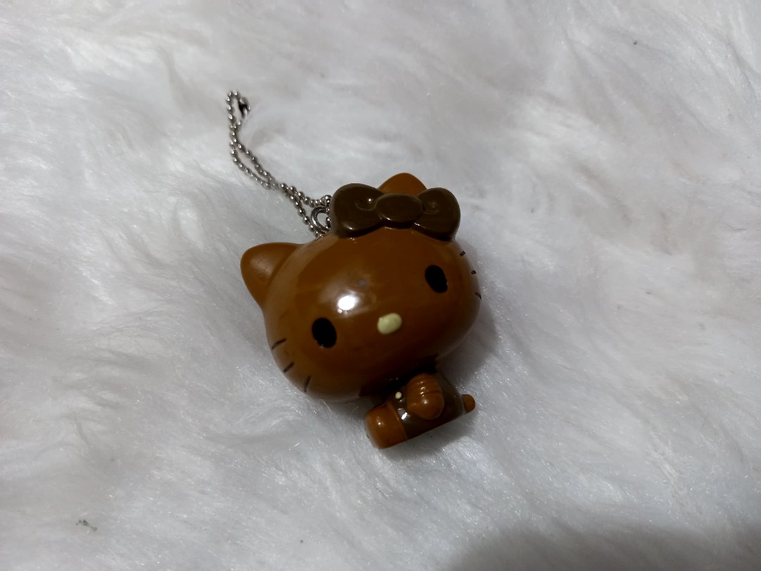 Sanrio 2003 Tanned Hello Kitty Charm, Hobbies & Toys, Toys & Games on Carousell