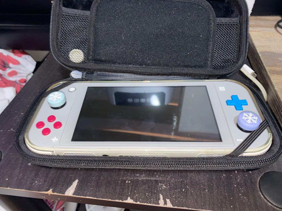 Nintendo switch lite with 2 games, Video Gaming, Video Game Consoles ...