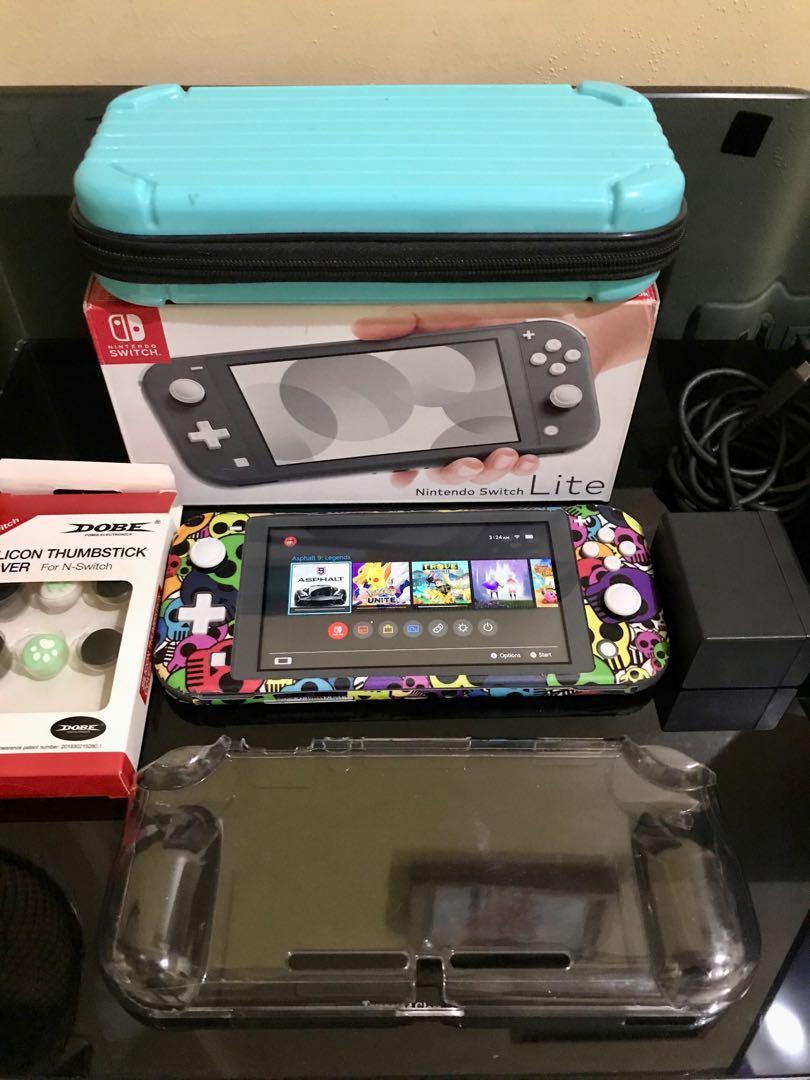 Nintendo switch lite with games, Video Gaming, Video Game Consoles ...