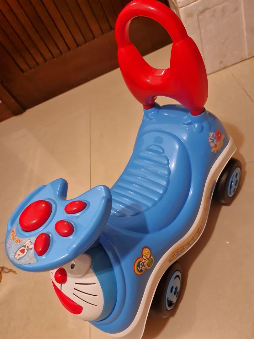 Doraemon Ride On Toy Car with Music, Hobbies & Toys, Toys & Games on ...