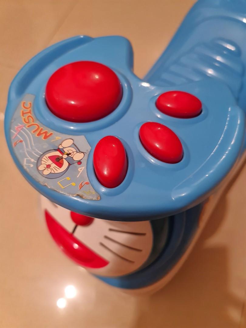 Doraemon Ride On Toy Car with Music, Hobbies & Toys, Toys & Games on ...