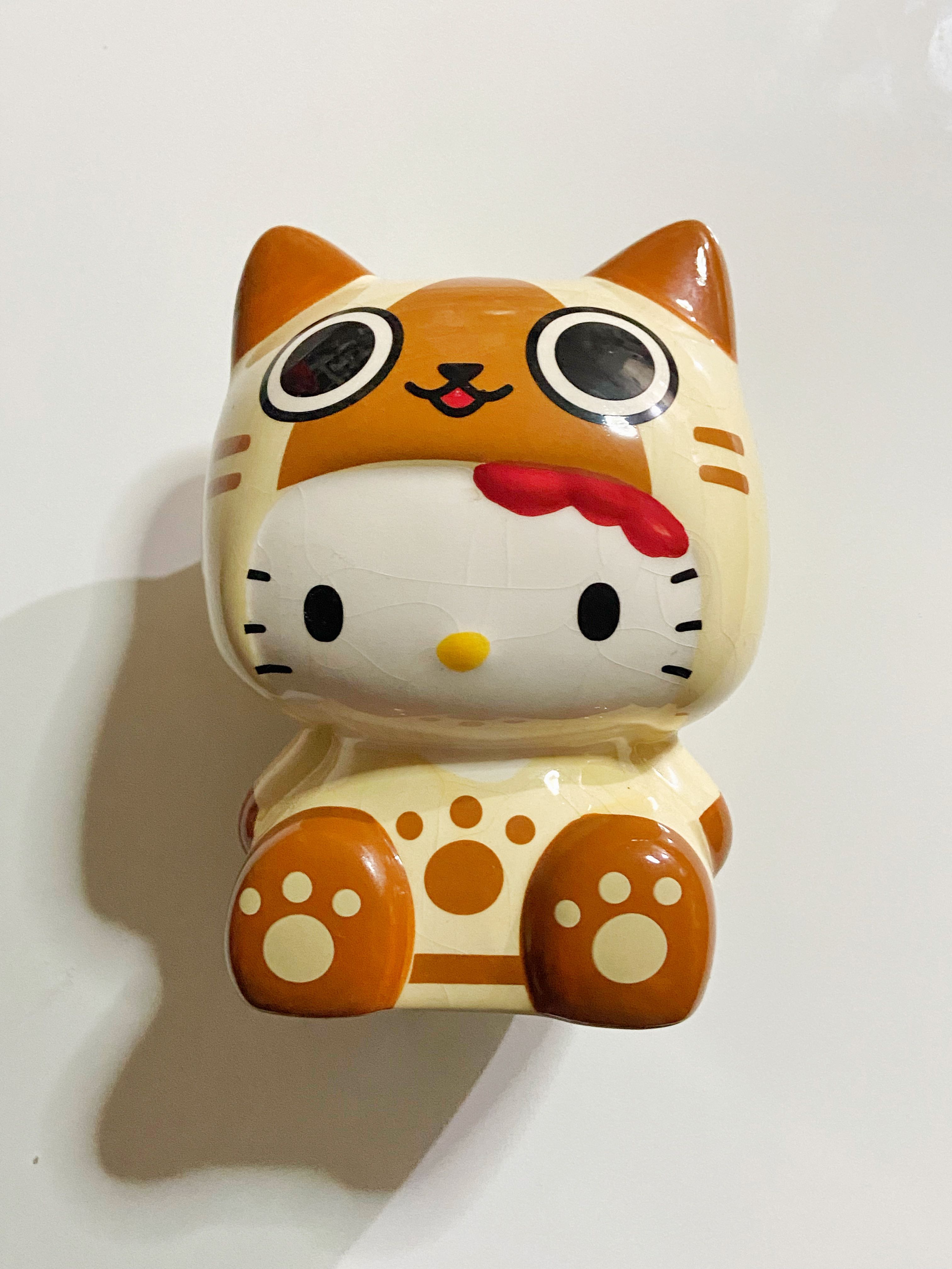 Hello kitty x Monster Hunter Airou Coinbank, Hobbies & Toys, Toys ...