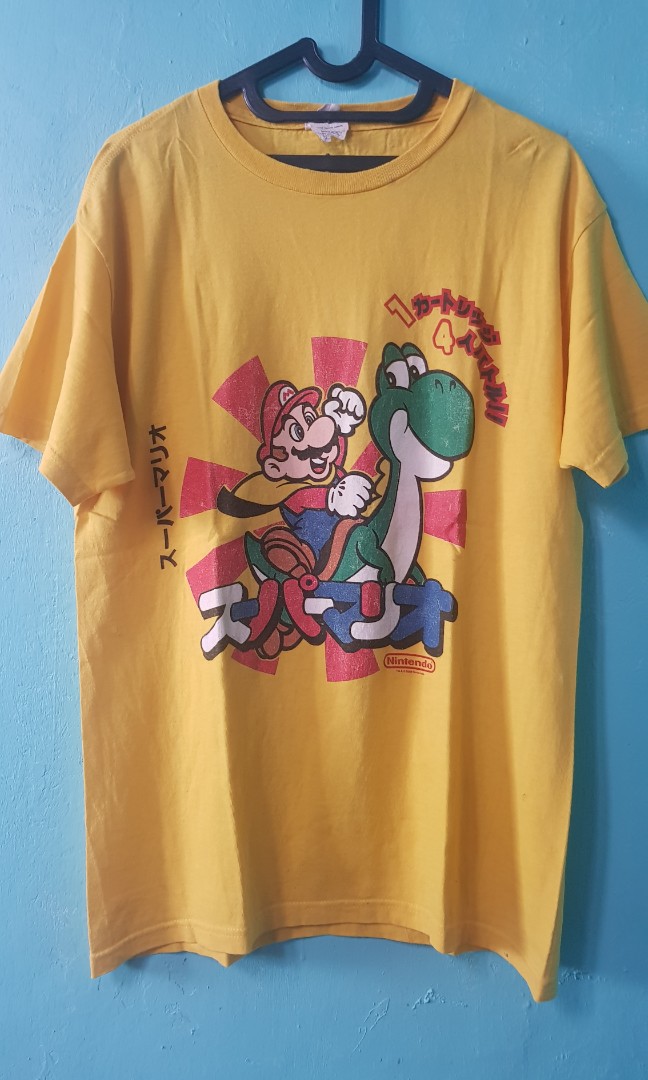 kaos mario bros kuning, Fesyen Pria, Pakaian , Atasan di Carousell