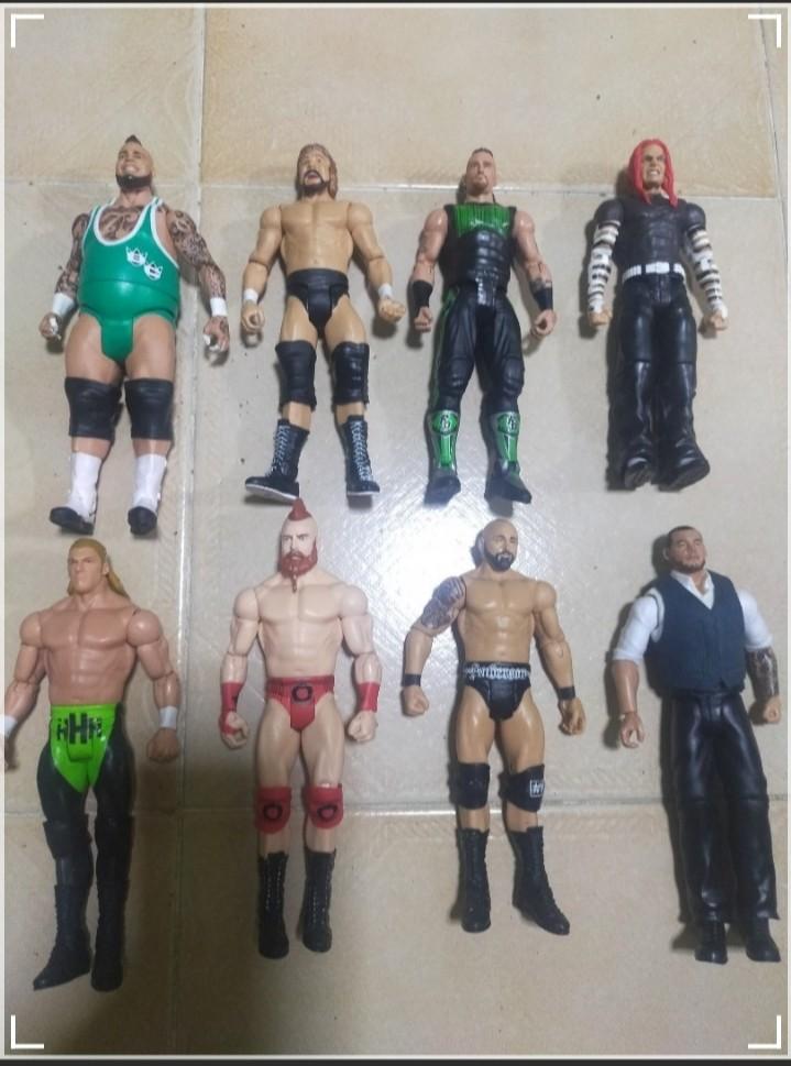 Wwe basic figure $10 andrade kurt angle rick rude hacksaw jim akam ...