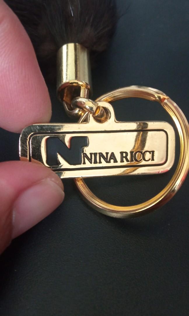 Vintage Nina Ricci Gold logo engraved plate charm with fur, Women's ...