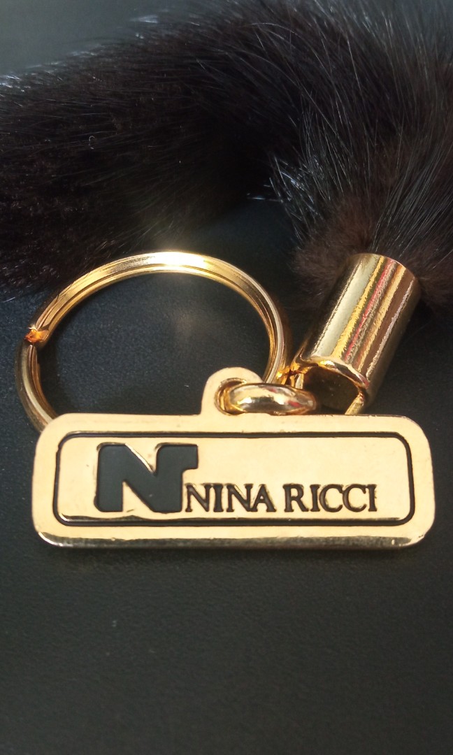 Vintage Nina Ricci Gold logo engraved plate charm with fur, Women's ...