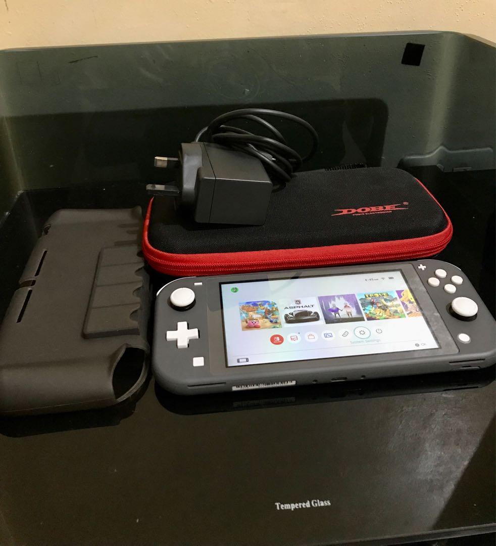 Nintendo switch lite with games, Video Gaming, Video Game Consoles ...