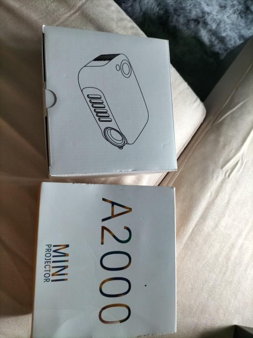 A2000 mini projector orange color, TV & Home Appliances, TV ...