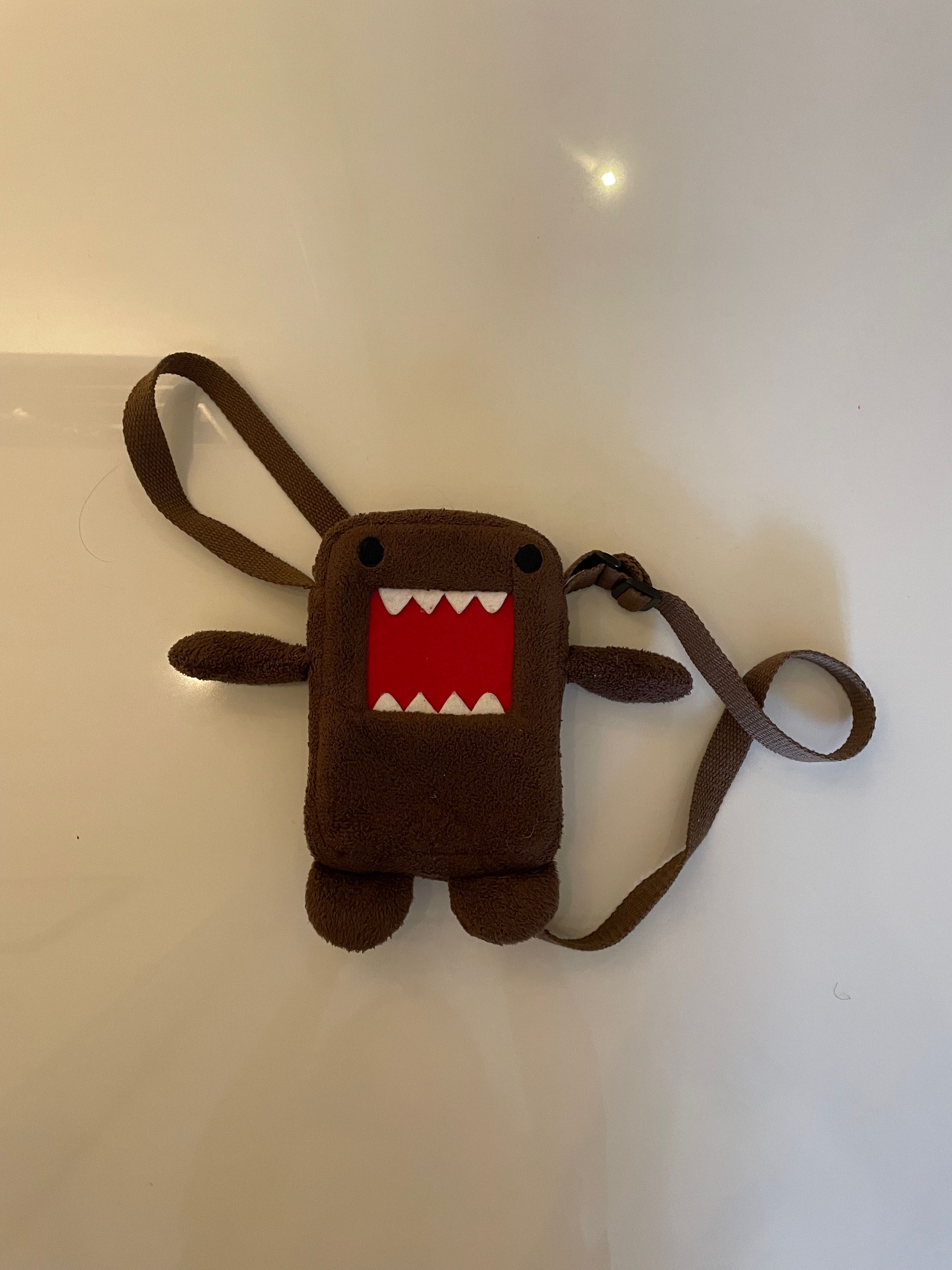 Domo Sling, Women's Fashion, Bags & Wallets, Cross-body Bags on Carousell