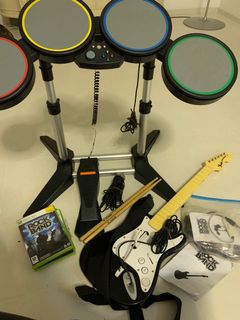 Rock Band set. Guitar, drums, drumsticks, microphone, 4 Rockband games ...