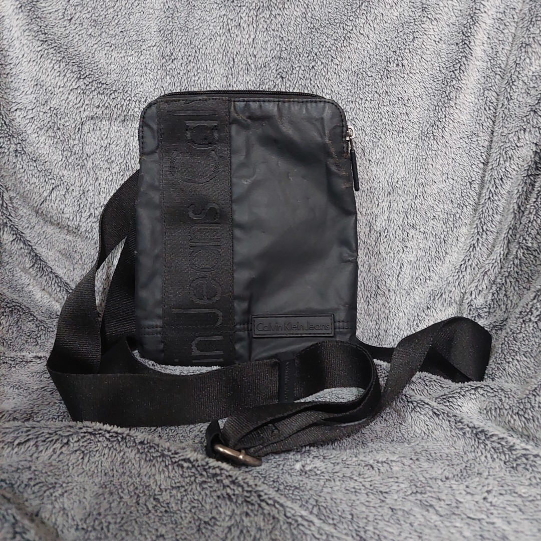 Original Calvin Klein mini sling for men, Men's Fashion, Bags, Sling ...