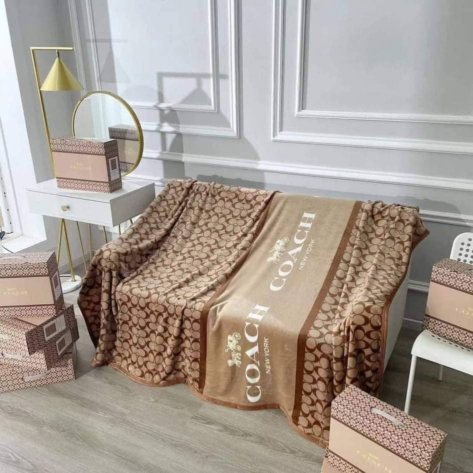 Coach fur blanket, Furniture & Home Living, Bedding & Towels on Carousell