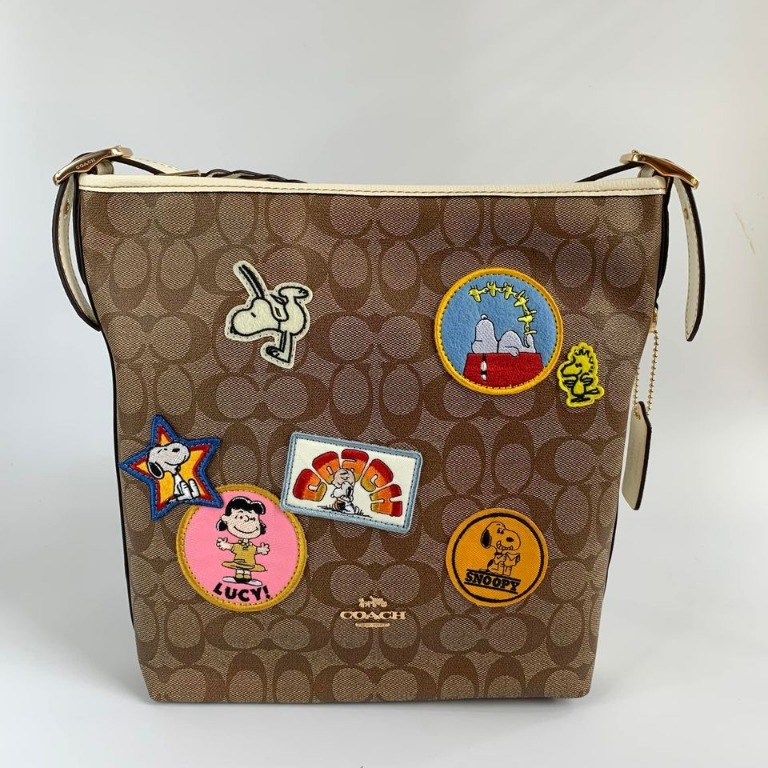 Coach X Peanuts Val Duffle In Signature Canvas With Varsity Patches ...