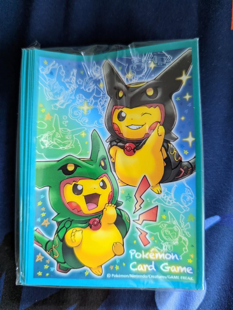 Pokemon Pikachu Poncho wearing Rayquaza card sleeves, Hobbies & Toys ...