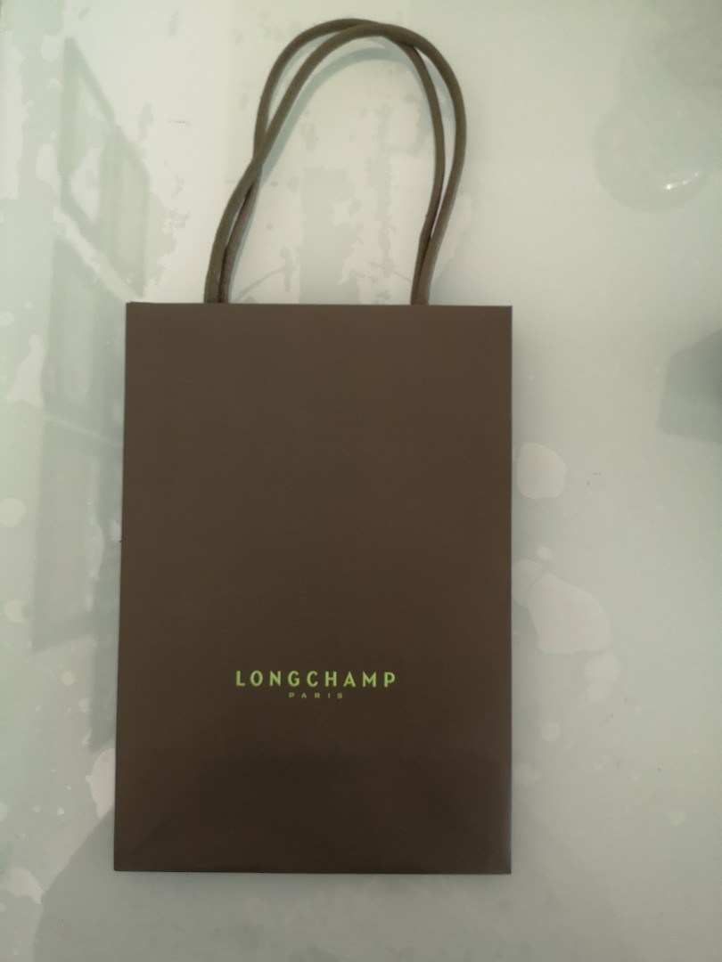 Longchamp paper bag, Luxury, Bags & Wallets on Carousell