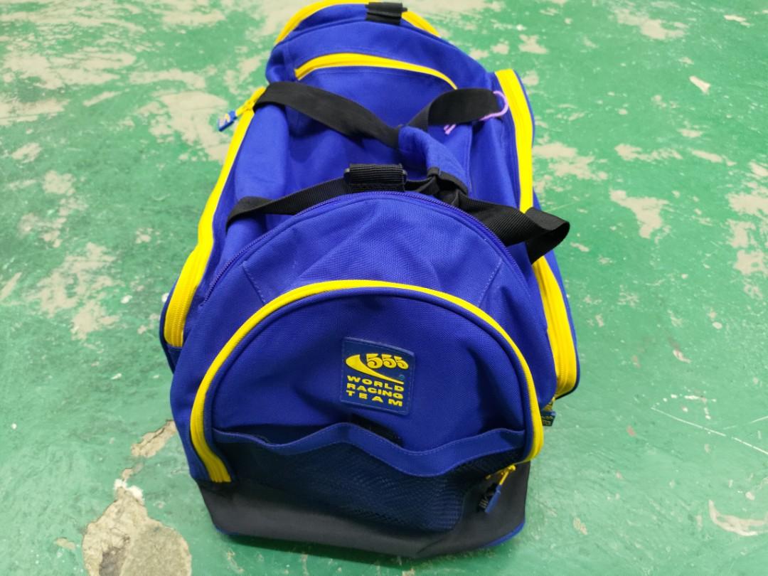 555 world racing duffle bag, Luxury, Bags & Wallets on Carousell