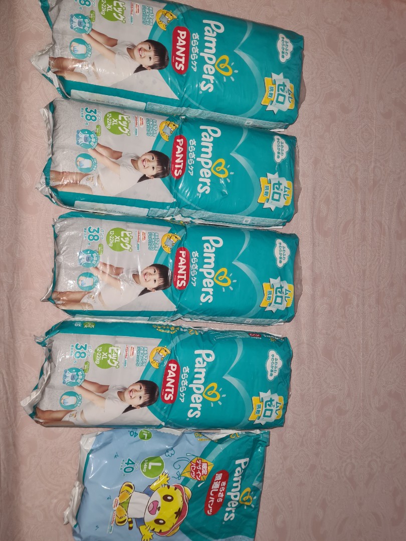 Pampers XL - 4 packets*38 pieces ( free 8 large loose diapers too ...