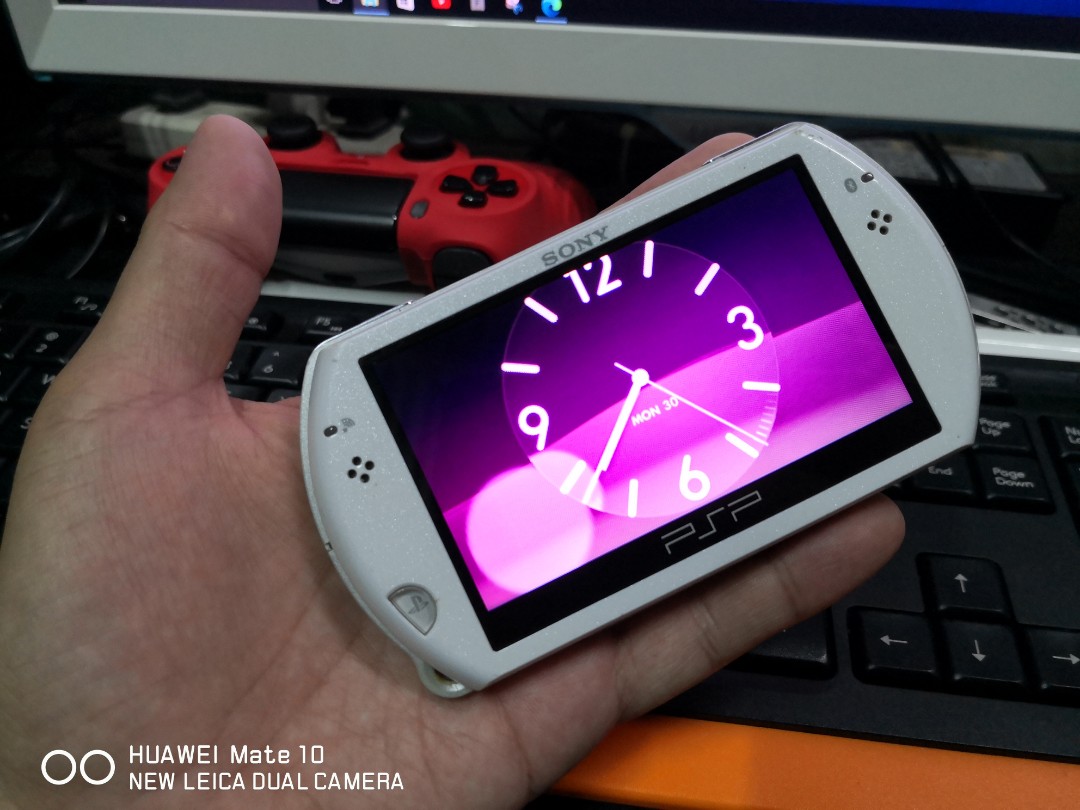 FOR SALE : SONY PSP GO, Pocket PSP, Pear white, 16gb with 36 Game's ...