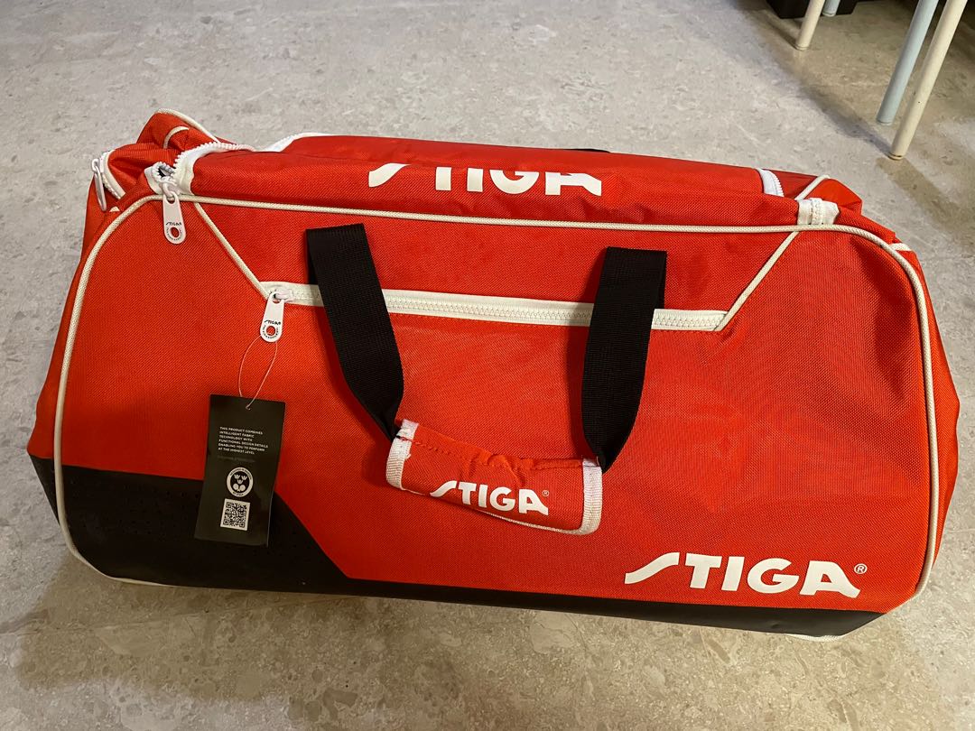 Orange Stiga duffel bag, Men's Fashion, Bags, Sling Bags on Carousell