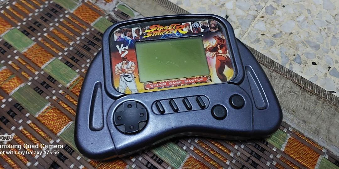 Vintage Handheld Game (Faulty), Hobbies & Toys, Toys & Games on Carousell