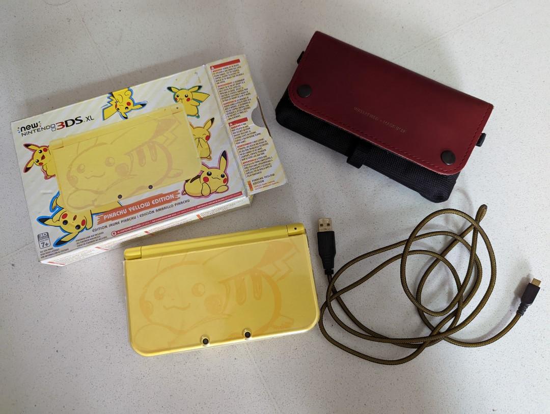 3DS XL Pikachu yellow edition with box and charger and case, Video ...