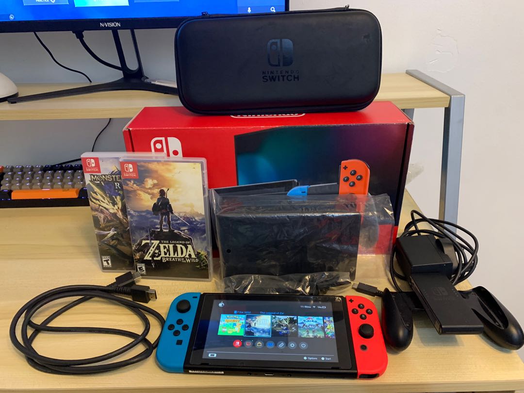 Nintendo Switch V2 complete with original box accessories. Games: BOTW ...