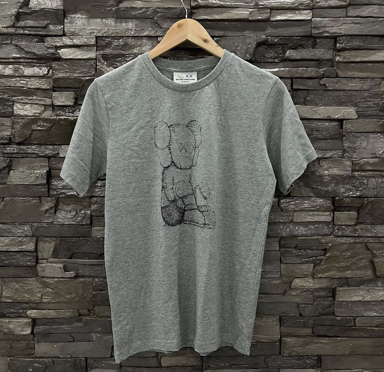 Kaws Tee Shirt, Men's Fashion, Tops & Sets, Formal Shirts on Carousell