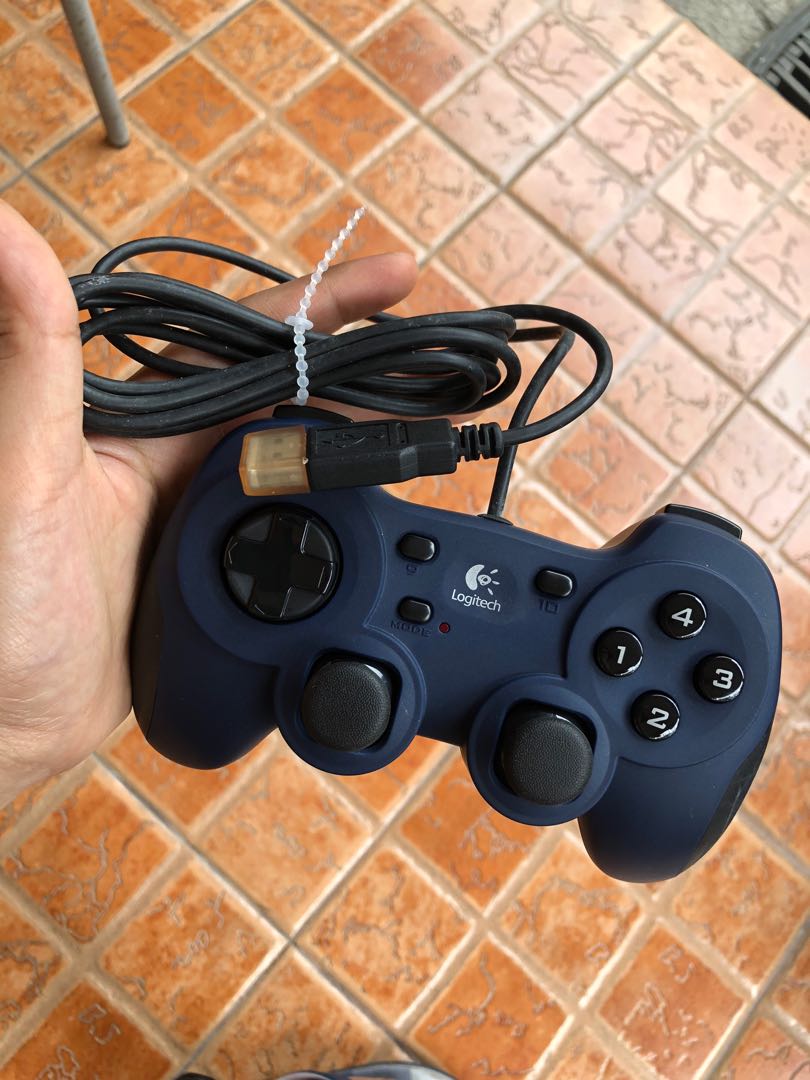 Logitech Dual Action Game Pad USB, Video Gaming, Gaming Accessories, Controllers on Carousell
