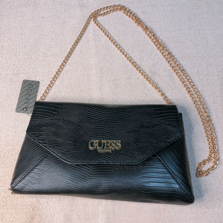 Guess chain crossbody bag US bought, Luxury, Bags & Wallets on Carousell