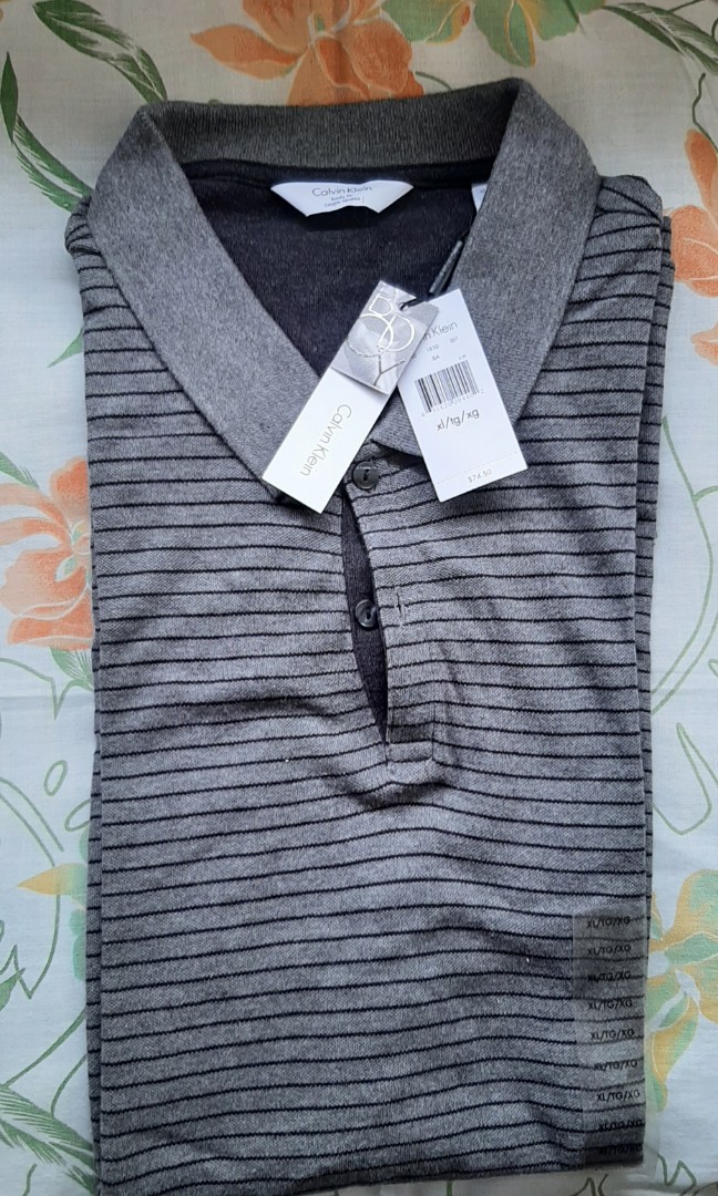 Calvin Klein polo shirt, Men's Fashion, Tops & Sets, Tshirts & Polo Shirts on Carousell