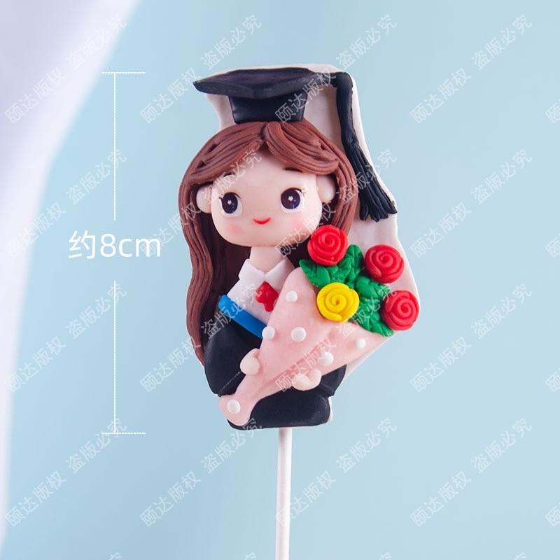 BRANDNEW GRADUATE IN TOGA CAKE TOPPER, Hobbies & Toys, Stationary ...