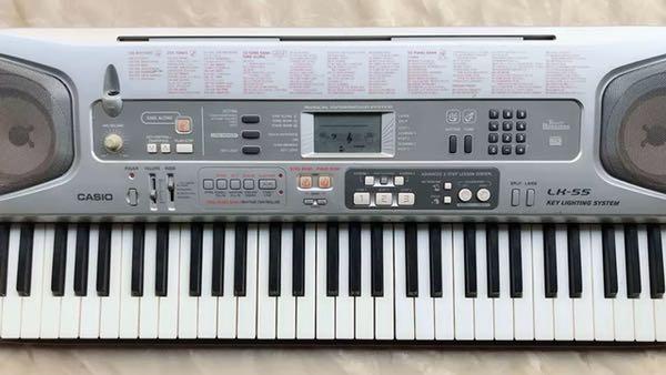 Casio LK 55 61 key with key lighting system(with keyboard stand ...