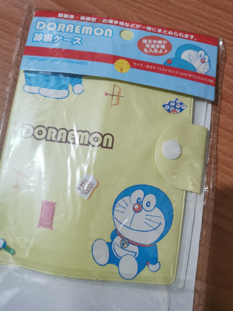 Doraemon plastic holder, Men's Fashion, Watches & Accessories ...