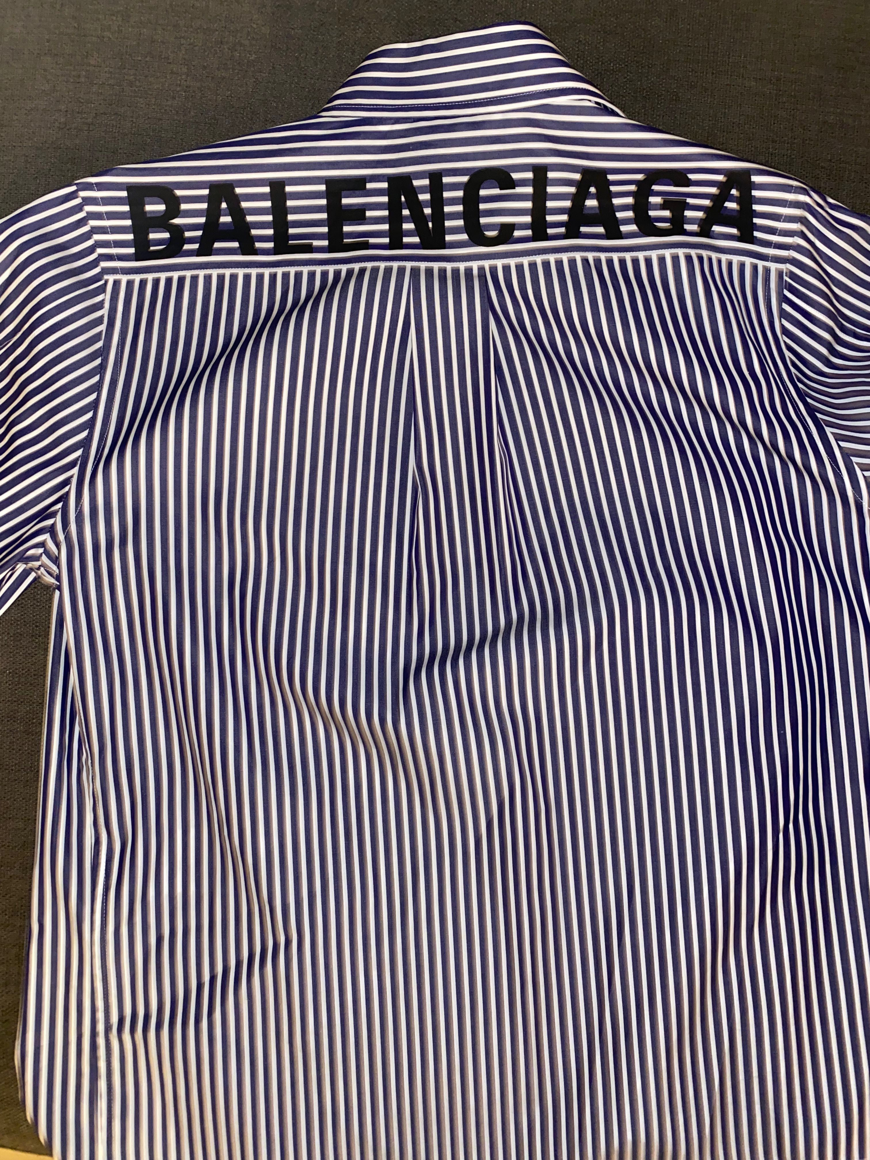 Balenciaga shrunk logo shirt, Women's Fashion, Tops, Shirts on Carousell