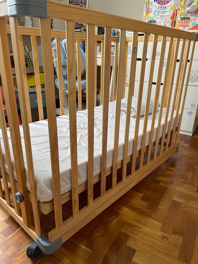 Adjustable height Wooden baby cot with lockable wheels, Babies & Kids ...